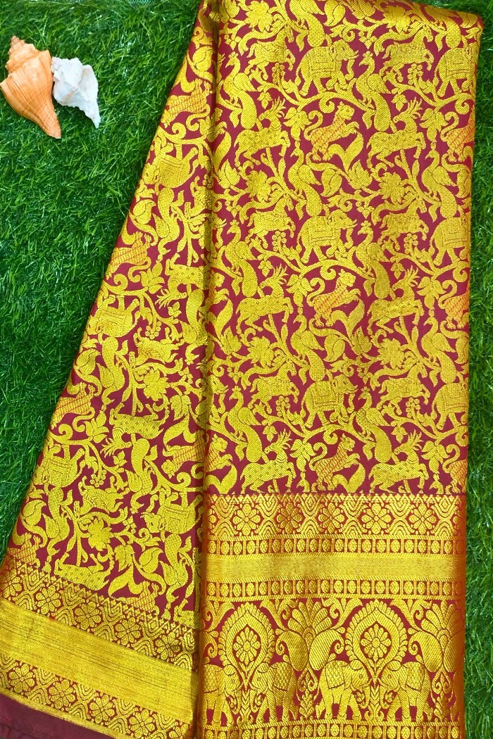 Exquisite Maroon Kanjivaram Semi Tissue Silk Saree